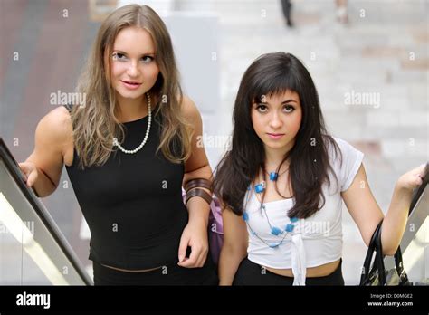 Women On Escalator Stock Photo Alamy