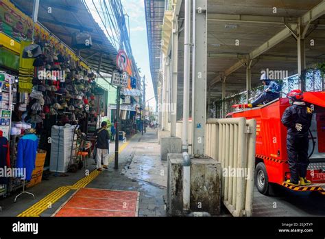 Indonesian Firefighters Spray Disinfectant Liquid At A Market In