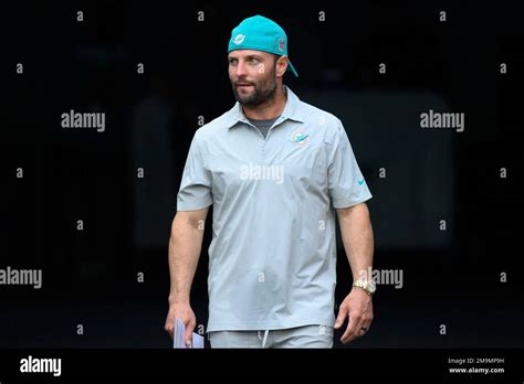 Miami Dolphins Wide Receivers Coach Wes Welker Walks Onto The Field