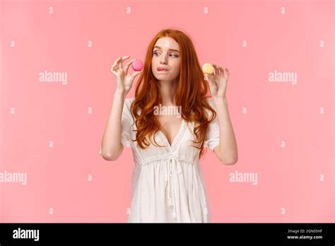 Delicious Food Consumer And Lifestyle Concept Attractive Picky Redhead Girl Choosing Which