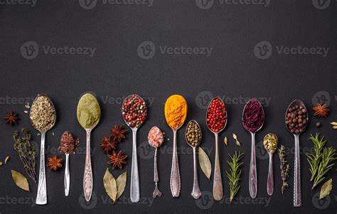 Composition Consisting Of Variations Of Spices In White Bowls And Metal