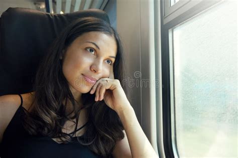 Young Beautiful Woman Looking Through The Train Window Happy Train