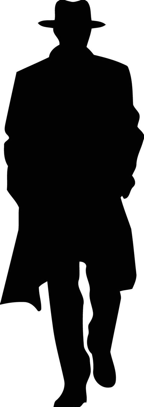 A Dramatic Silhouette Of A Man In A Trench Coat And Fedora Walking