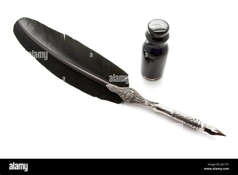 Feather Pen And Ink Bottle On Old Paper Background Stock Photo Alamy