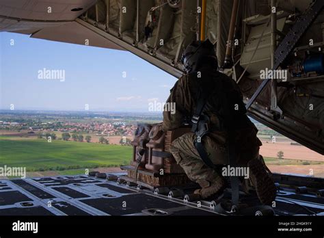 A Us Air Force Loadmaster From The 37th Airlift Squadron Prepares To