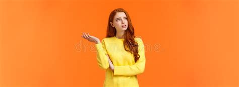 Troubled And Unsure Indecisive Cute Redhead Girl Trying Solve Problem