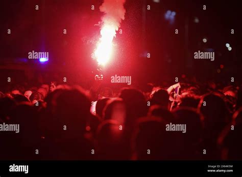 Details With The Hands Of A Man Holding A Torch Inside During A