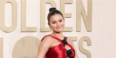 Selena Gomez Stuns In Red Silk Dress With Torso Cut Outs At The Golden Globes