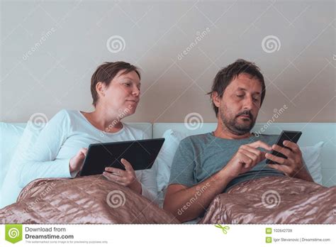 Bored Couple Husband And Wife In Bedroom Stock Image Image Of Male