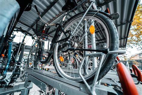 Many bicycle in a row. Bicycle parking at the street 11521959 Stock Photo at Vecteezy