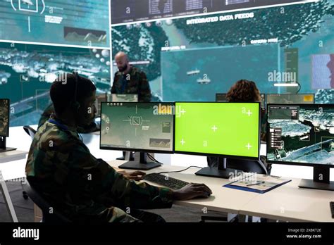Army Personnel Monitors Isolated Green Screen And Surveillance Footage Gathering Important