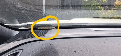 Foam Lining Popping Out From Where The Dash And Windshield Meet