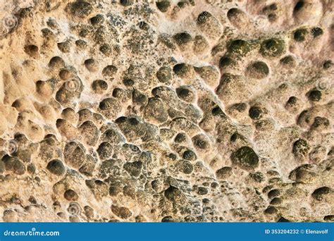 Natural Erosion Patterns In Weathered Rock Surface With Unique Textures