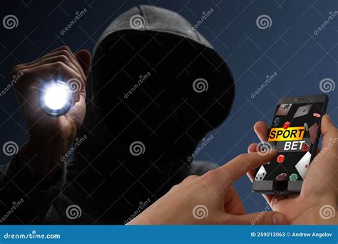 Man In Hood With Smartphone And Sport Bet Hacker Stock Image Image