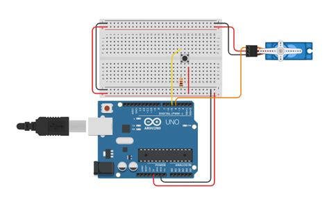 circuit design micro servo e push button tinkercad