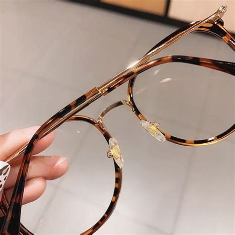 Brand Name Soandeigender Unisexframe Material Plastic Titaniumorigin