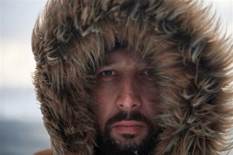 Premium Photo Portrait Local Authentic Eskimo Man At Winter In Stormy