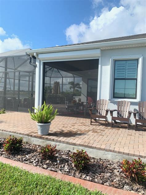 Aluminum Clam Shell Awnings Maximum Resistance Storm Shutters