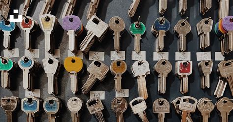A Wall Displaying Many Different Types Of Keys Photo Free Background Image On Unsplash
