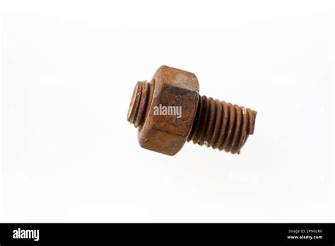 Rusty Nut And Bolt Which Has Been Snipped Or Broken From Its Head