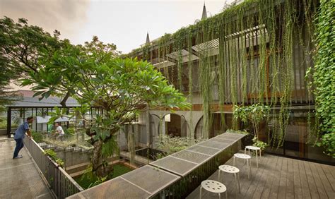Lush Greenery Envelops Raw Architectures Multi Use Complex In Indonesia
