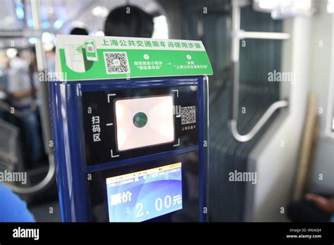 A POS Machines Installed On A Bus For Passengers To Scan The QR Codes Of Bus Fare Payment Though