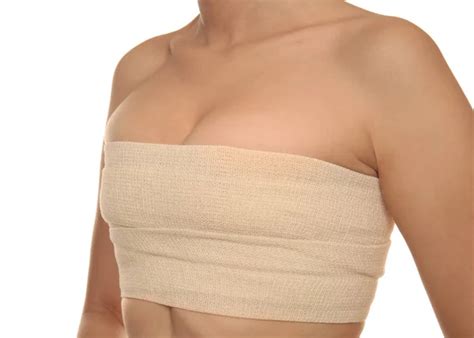 Woman Bandage Her Chest Dark Background Breast Augmentation Concept