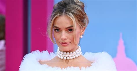 Margot Robbies Satin Couture Gown Pays Homage To Retro Barbie At The