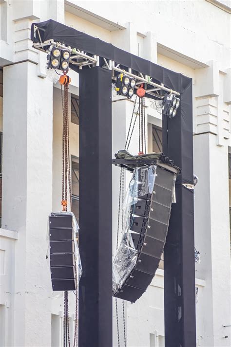 A Pair Of Rigging Lighting And Line Array Speakers At A Concert Or