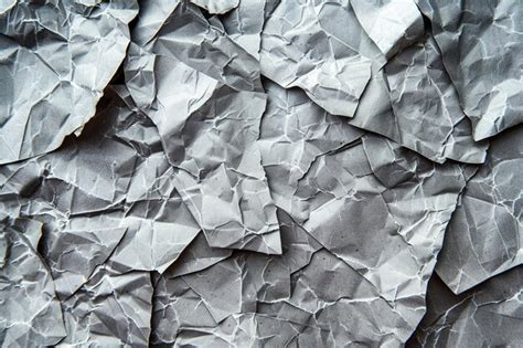 Premium Photo Scrunched Up Paper Background