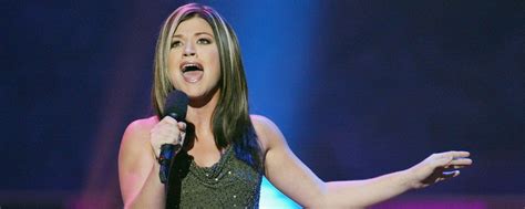 The Meaning Behind Kelly Clarksons Hit Debut Single A Moment Like