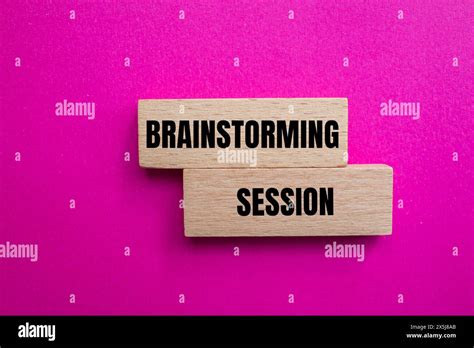 Brainstorming Session Words Written On Wooden Blocks With Pink
