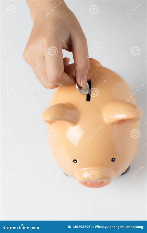 Woman Hand Putting Coin Into Piggy Bank Stock Photo Image Of Fashion