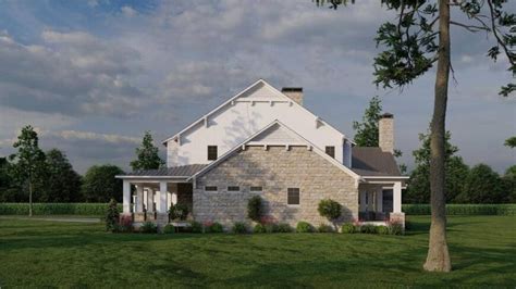 4 Bedroom Farmhouse Style Two Story Home With Balcony And Angled 3 Car