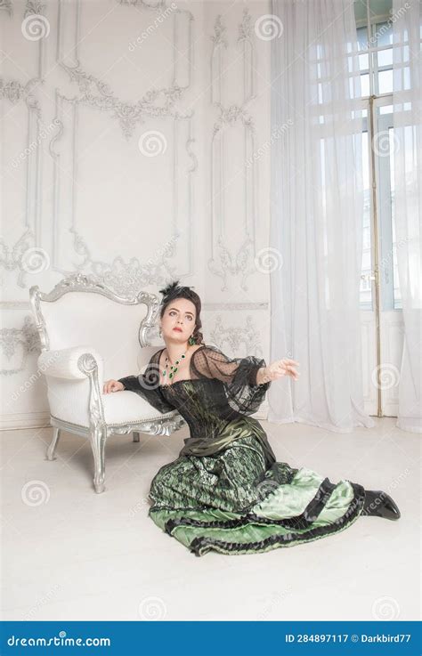 Sad Crying Woman Wearing Green Medieval Vintage Victorian Style Dress