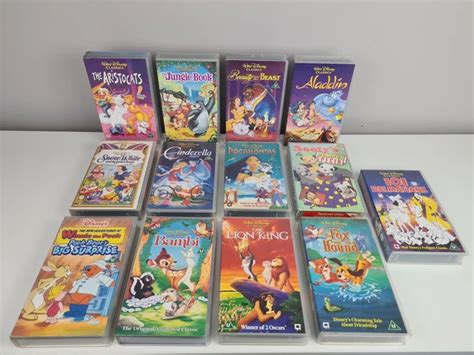 Job Lot Walt Disney Vhs Videos X13 Robin Hood Snow White Lion King