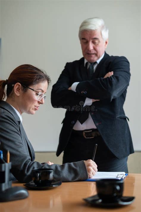 The Woman Signs The Contract Mature Man Indicates Where The Girl Put A