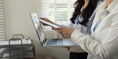 Business Team Analyzing Data Laptop Tablet Collaborative Meeting Stock