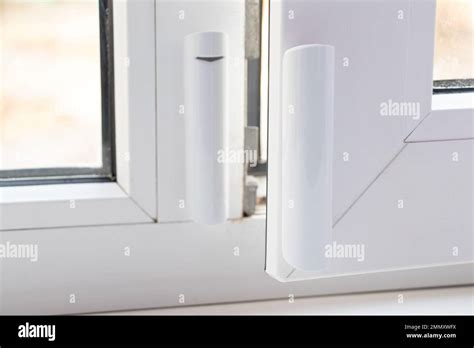 Window Opening Sensor Hanging On The Window Home Alarm System Home Protection Home Alarm