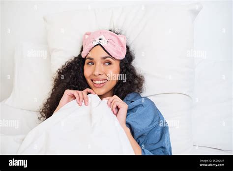 A Young Multi Ethnic Woman Wakes Up In Bed With A Cute Kitten Sleep