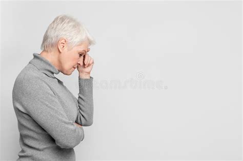 Elderly Woman In A Contemplative Side Pose Stock Photo Image Of Wise