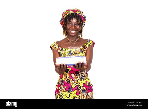 Beautiful Young Woman Wearing Traditional Loincloth Holding A Packet Of