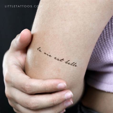 La Vie Est Belle Temporary Lettering Tattoo Located