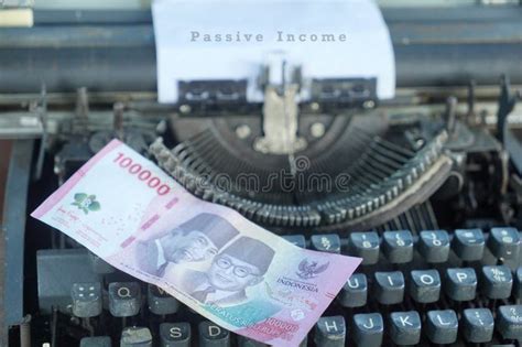 Passive Income Concept With Text Quote On A White Paper And Indonesian