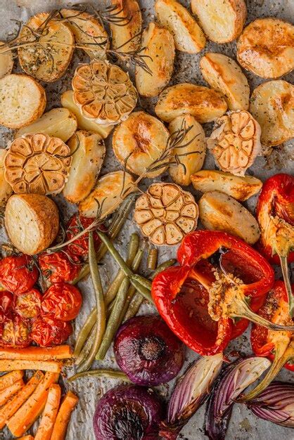 Premium Photo Oven Baked Vegetables With Spices Olive Oil And