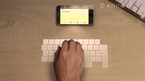 iPhone 5 con teclado láser e imágenes holográficas iPhoneate iNeate