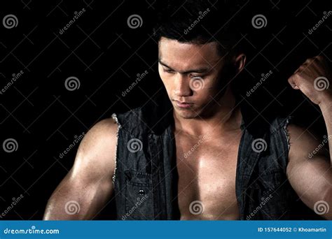 Asian Muscle Men Posing Muscle Front On The Black Background Body Gym