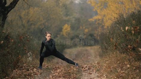 Runner Woman Is Stretching Legs With Lunge Hamstring Stretch Exercise Leg Stretches Fitness