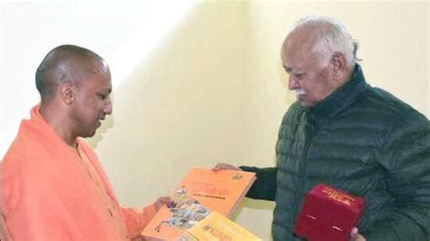 Yogi Adityanath Meet Rss Chief Mohan Bhagwat In Prayagraj Invites Him