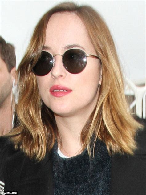 Fifty Shades Of Grey Star Dakota Johnson Opts For Colourful Ensemble As